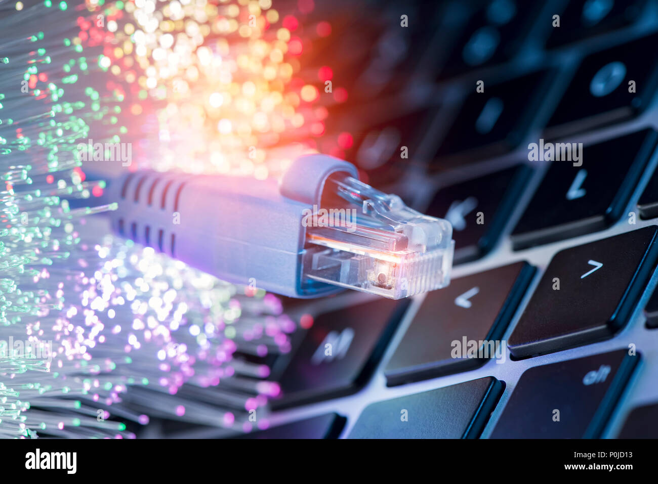 network cable closeup with fiber optical background Stock Photo - Alamy