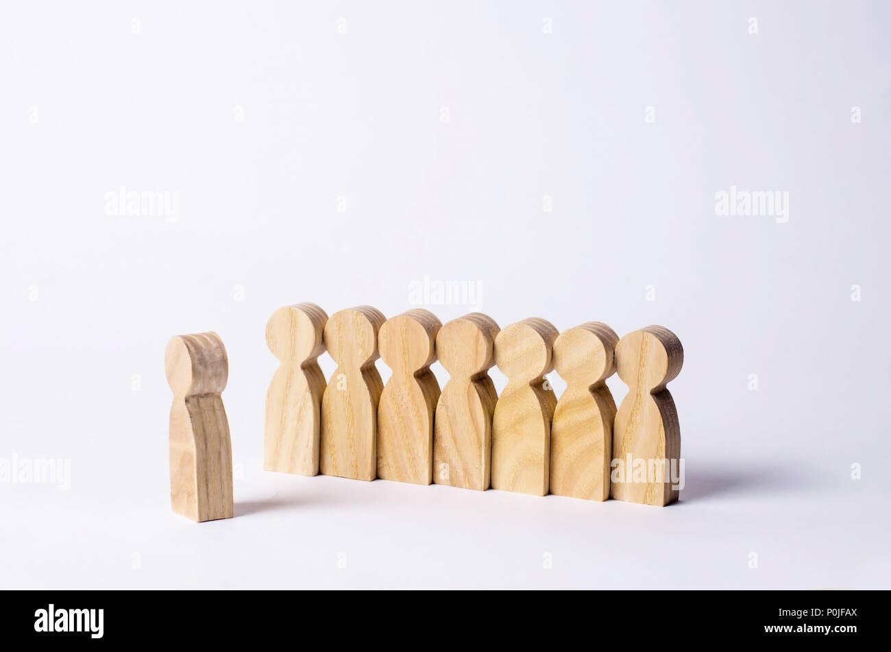People stand in line at the briefing and wait for orders. Wooden ...
