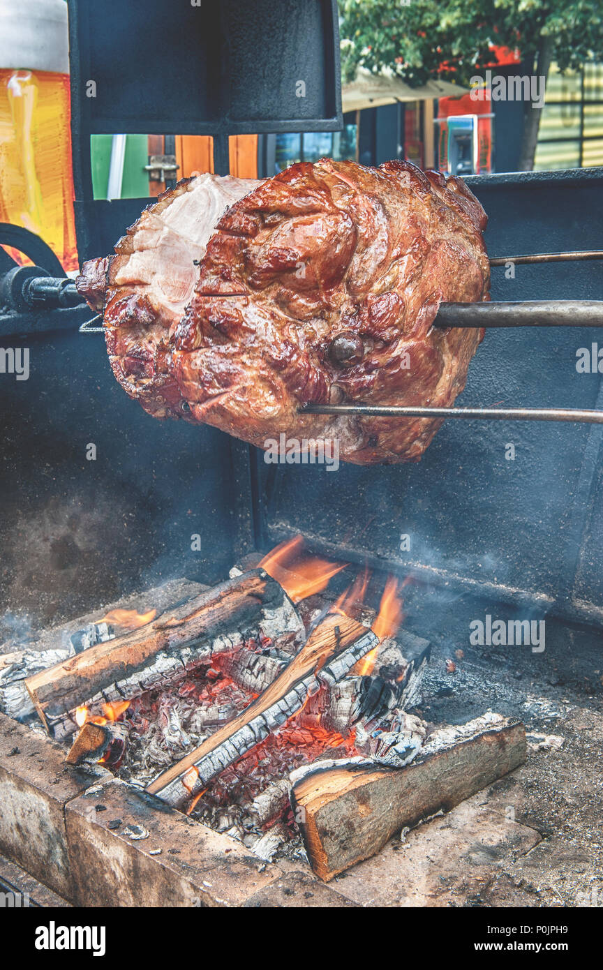 Spit Roast Meat Cooking Stock Photos & Spit Roast Meat Cooking Stock ...