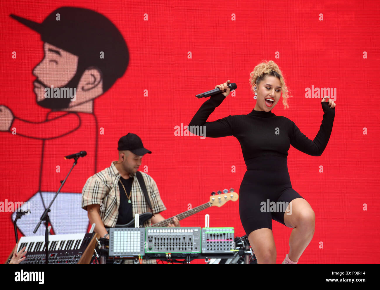 Raye performs on stage with Jax Jones during Capital's Summertime Ball ...