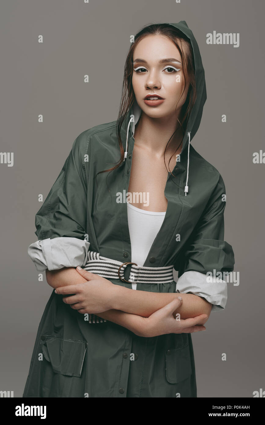 Grey raincoat hi-res stock photography and images - Alamy