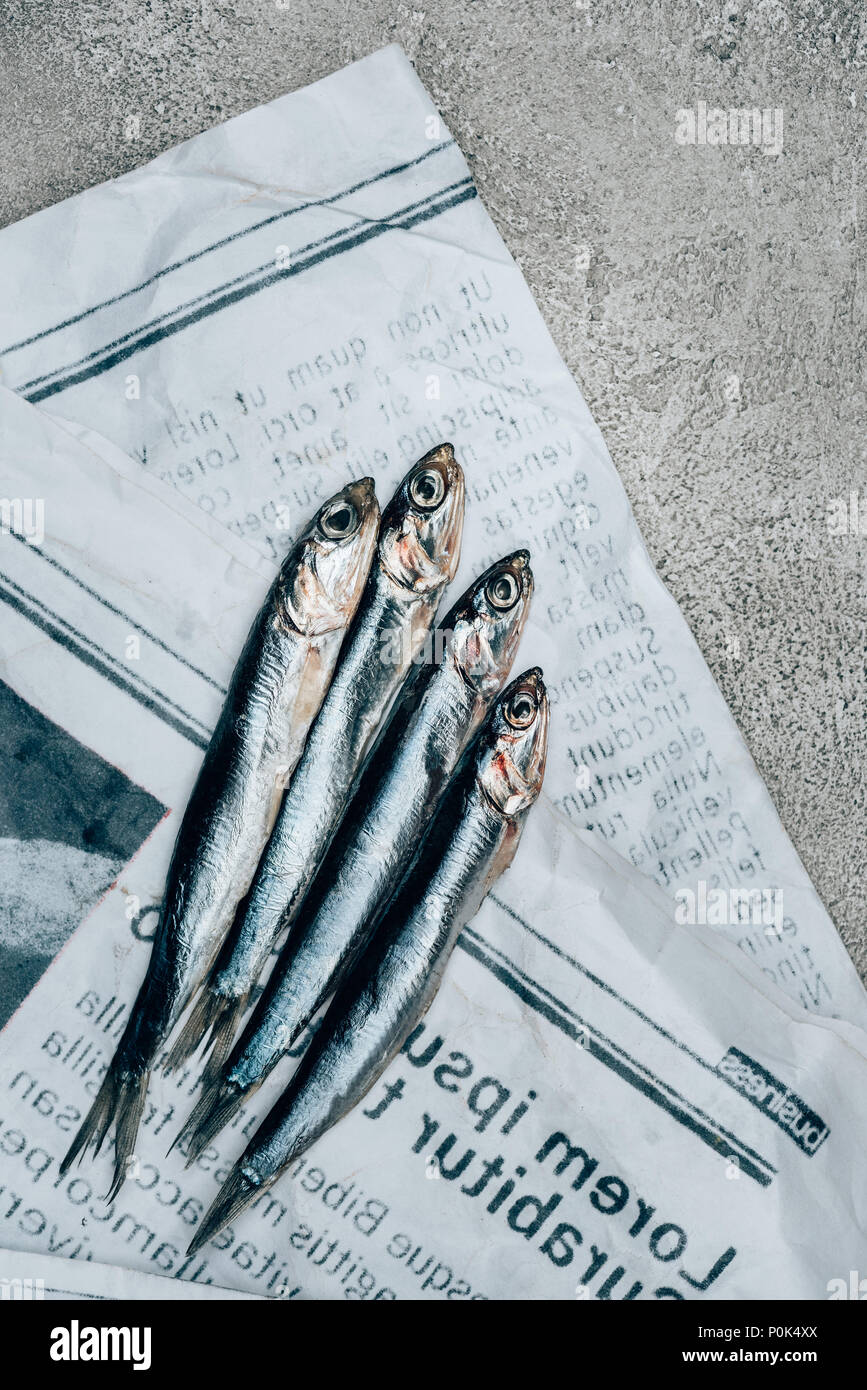 Fresh fish on newspaper hi-res stock photography and images - Alamy