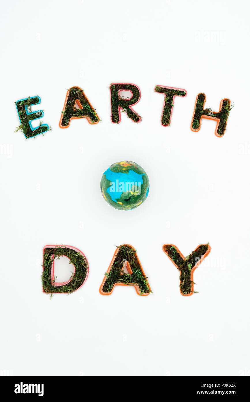 top view of earth model with text earth day isolated on white Stock ...