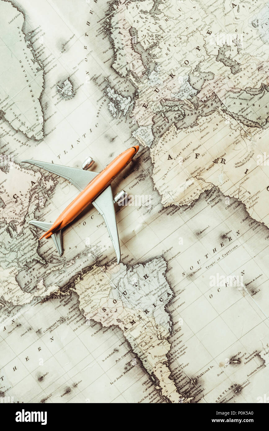 top view of toy plane on map Stock Photo - Alamy