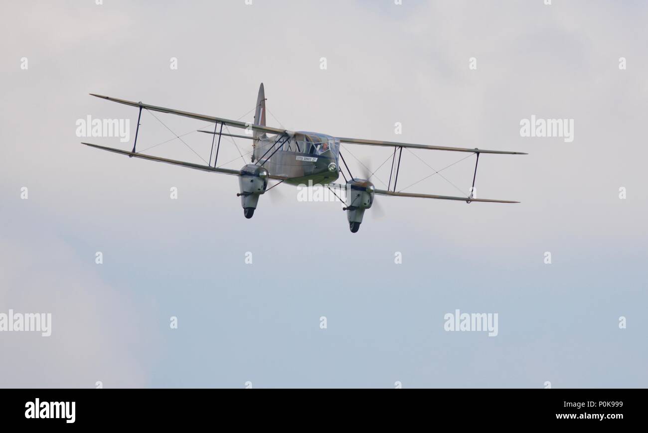 de Havilland Dragon Rapide flying at the Fly Navy airshow at ...