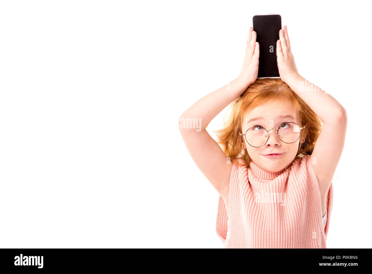 funny red hair kid holding smartphone on head isolated on white Stock ...