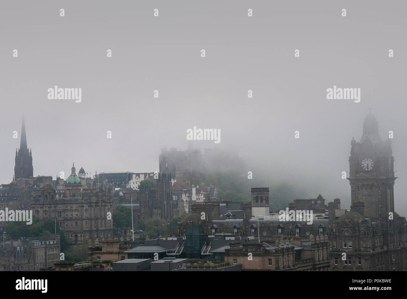 An atmospheric view of Edinburgh Castle on a misty day Stock Photo - Alamy