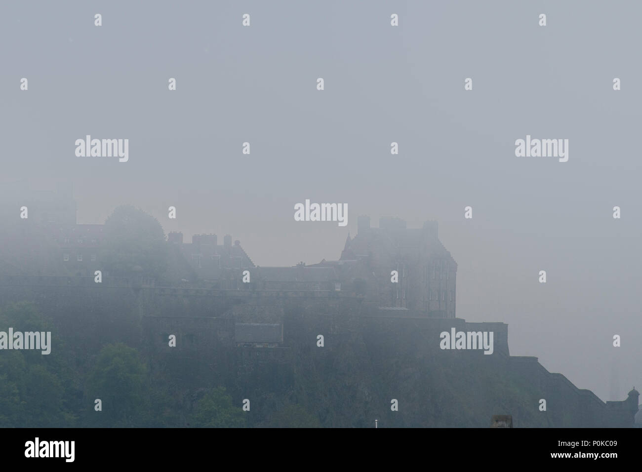 An atmospheric view of Edinburgh Castle on a misty day Stock Photo - Alamy