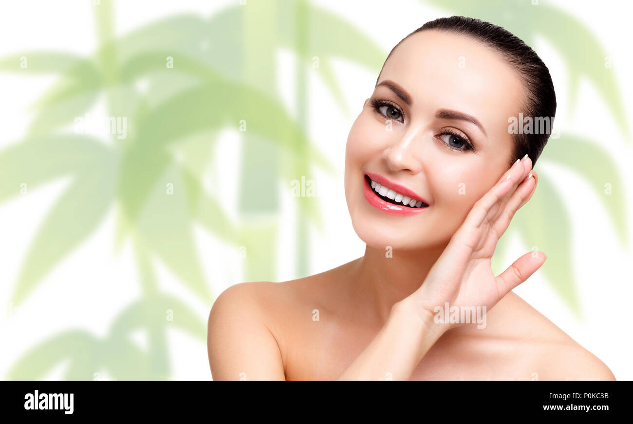 Woman with soft and smooth skin is smiling to you Stock Photo - Alamy