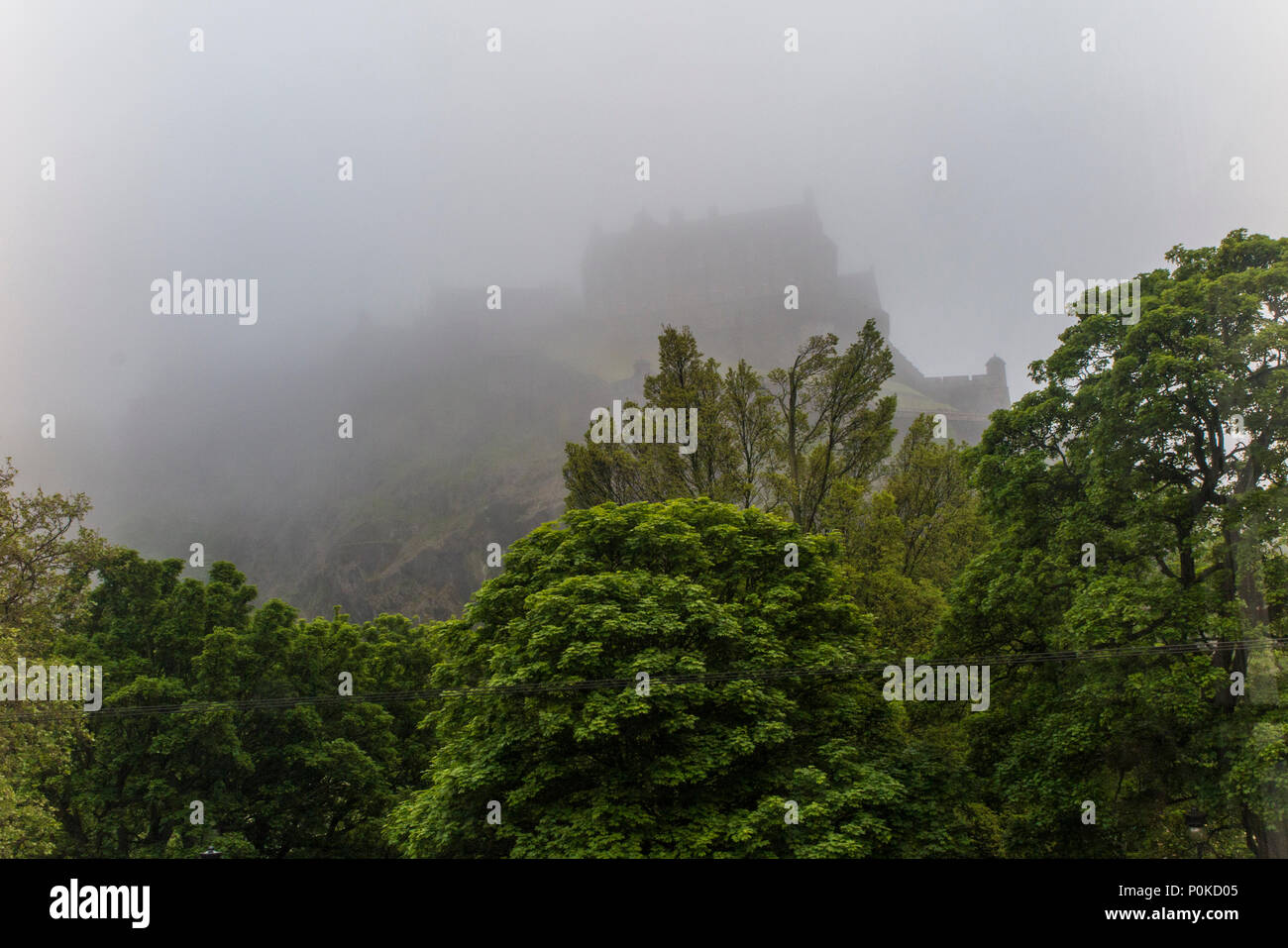 An atmospheric view of Edinburgh Castle on a misty day Stock Photo - Alamy