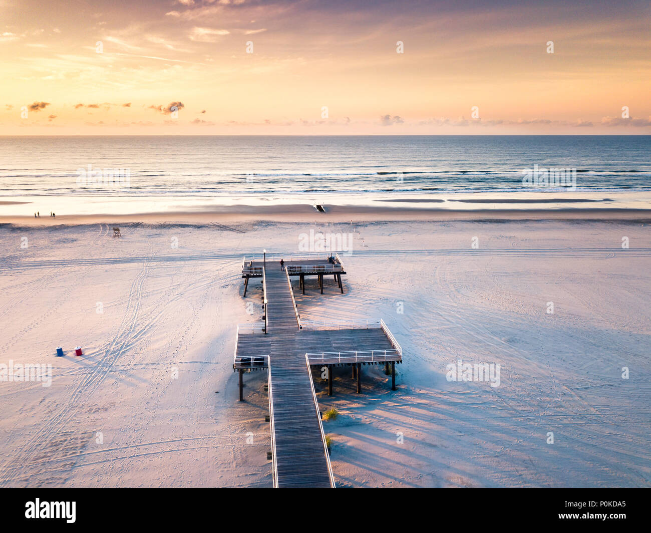 Sunrise over the ocean and wide beach aerial view Stock Photo - Alamy