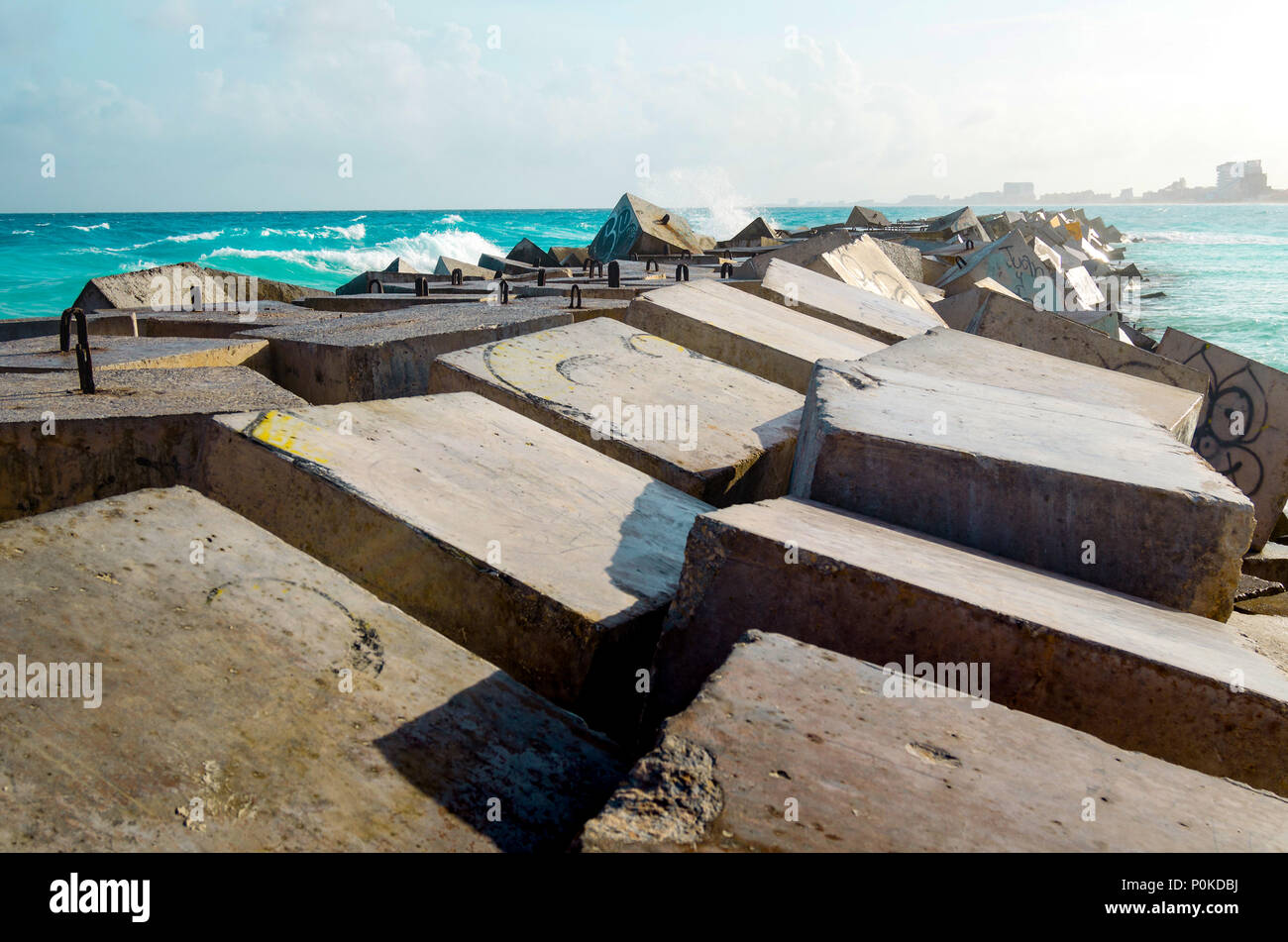 Closeup of a jetty made of huge concrete cubes Stock Photo - Alamy