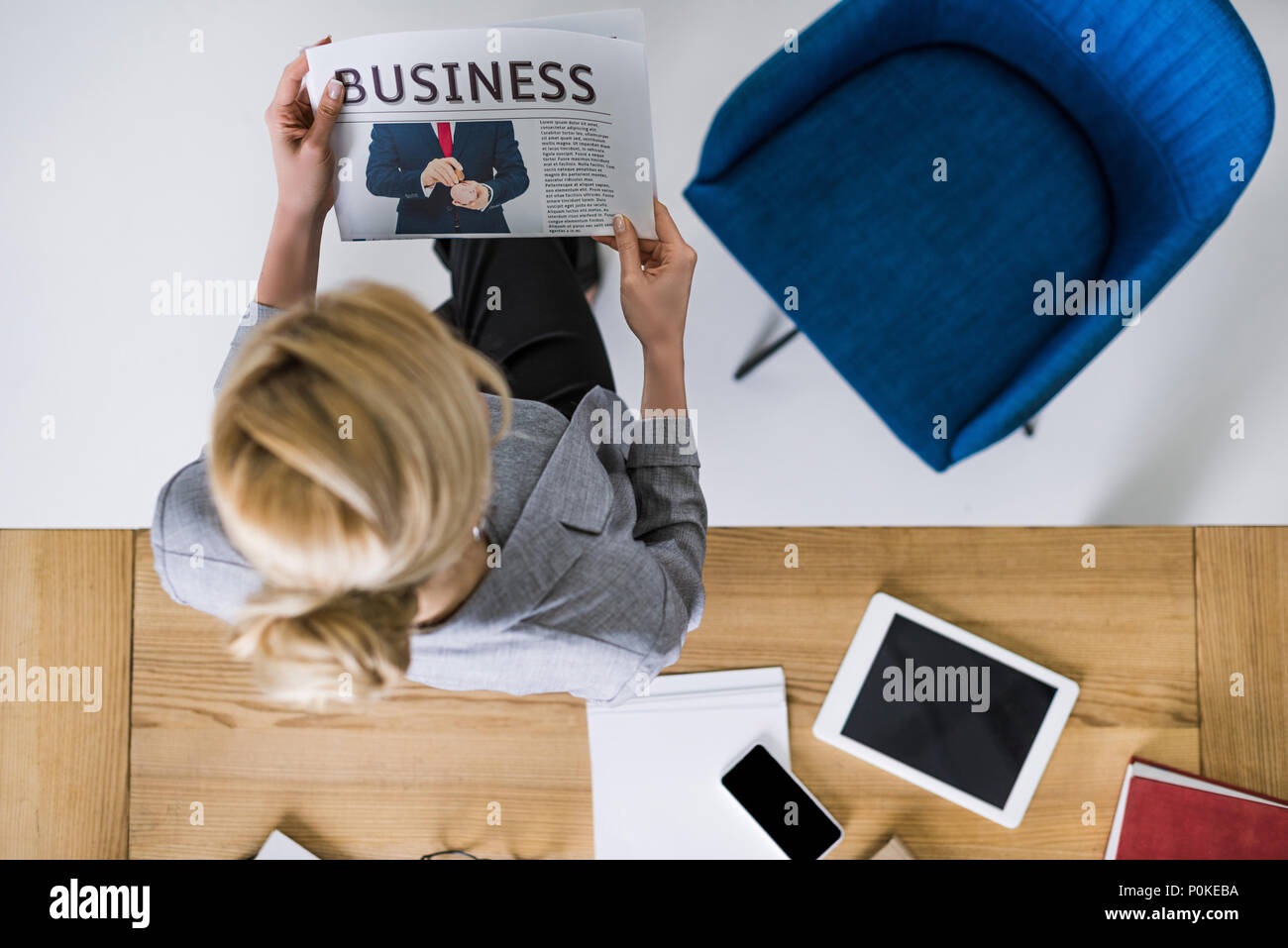 Business newspaper overhead hi-res stock photography and images - Alamy