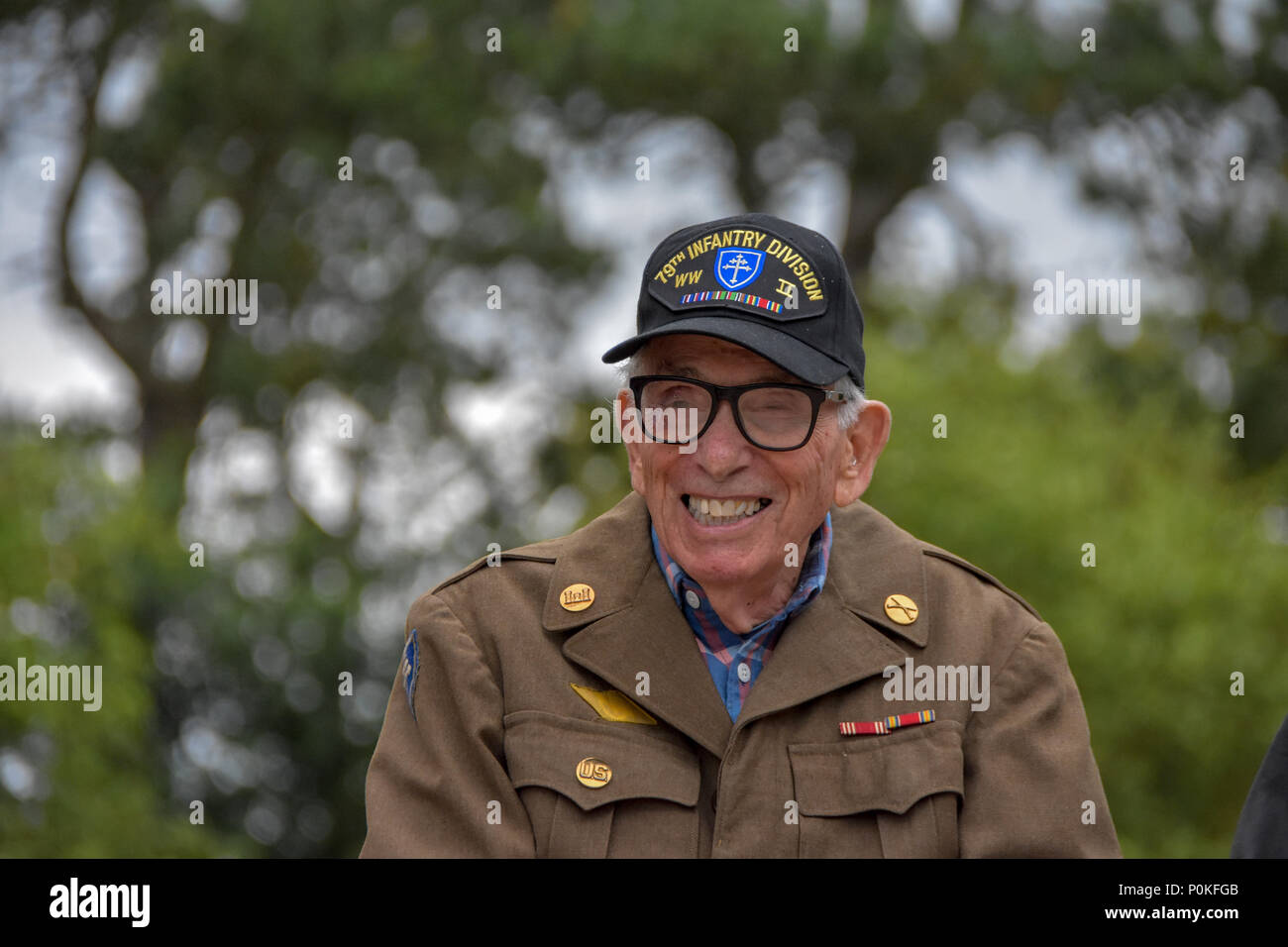 A World War 2 veteran smiles with pride as he and his fellow warriors ...