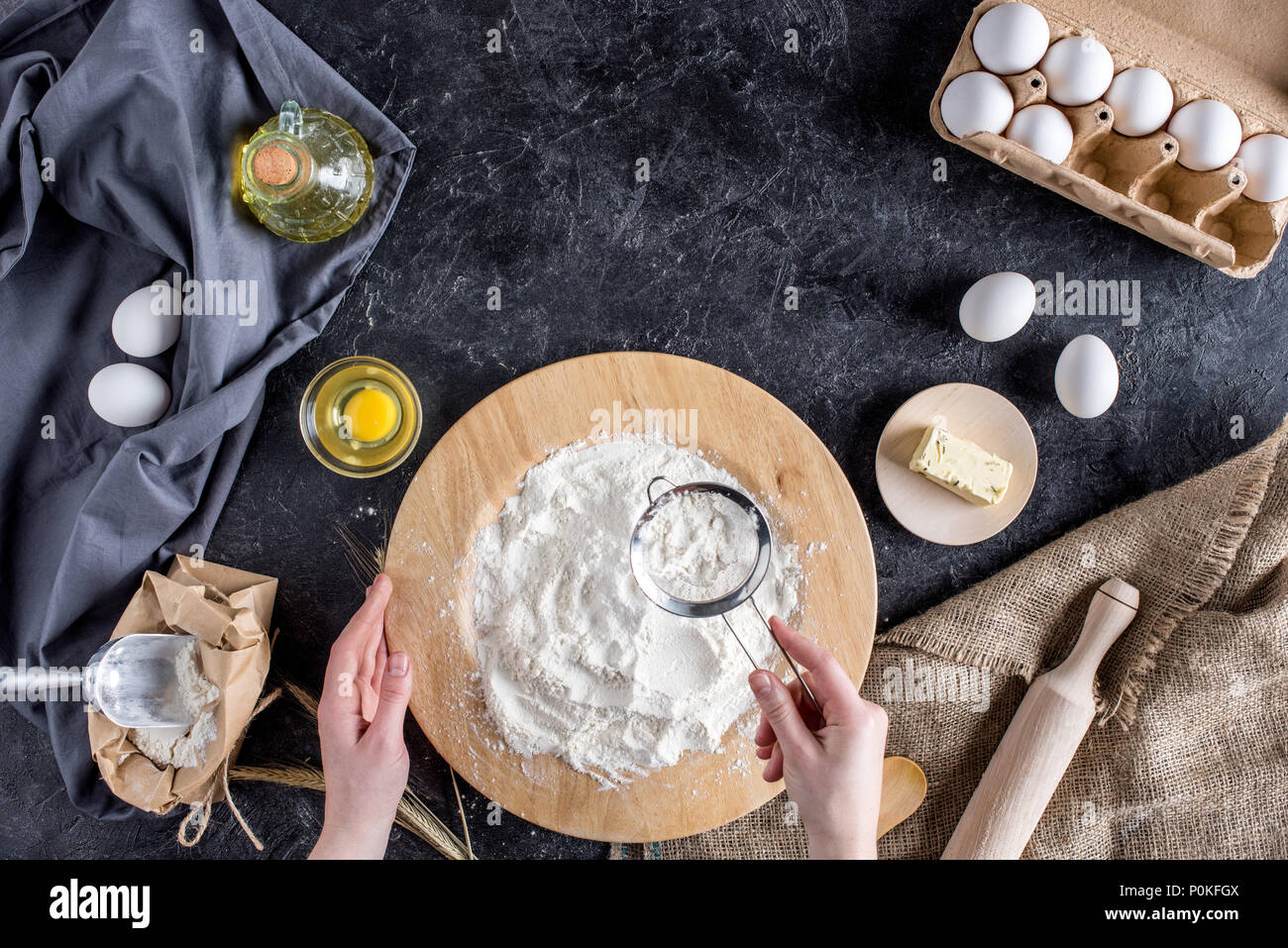 cropped shot of woman mixing ingredients for bread Stock Photo - Alamy