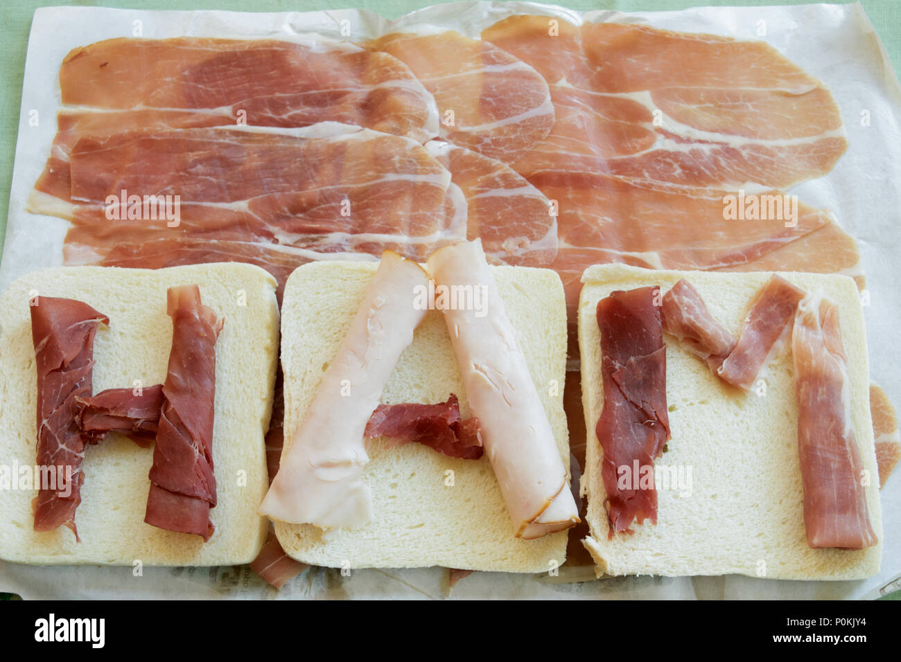written ham on sandwich breads Stock Photo - Alamy