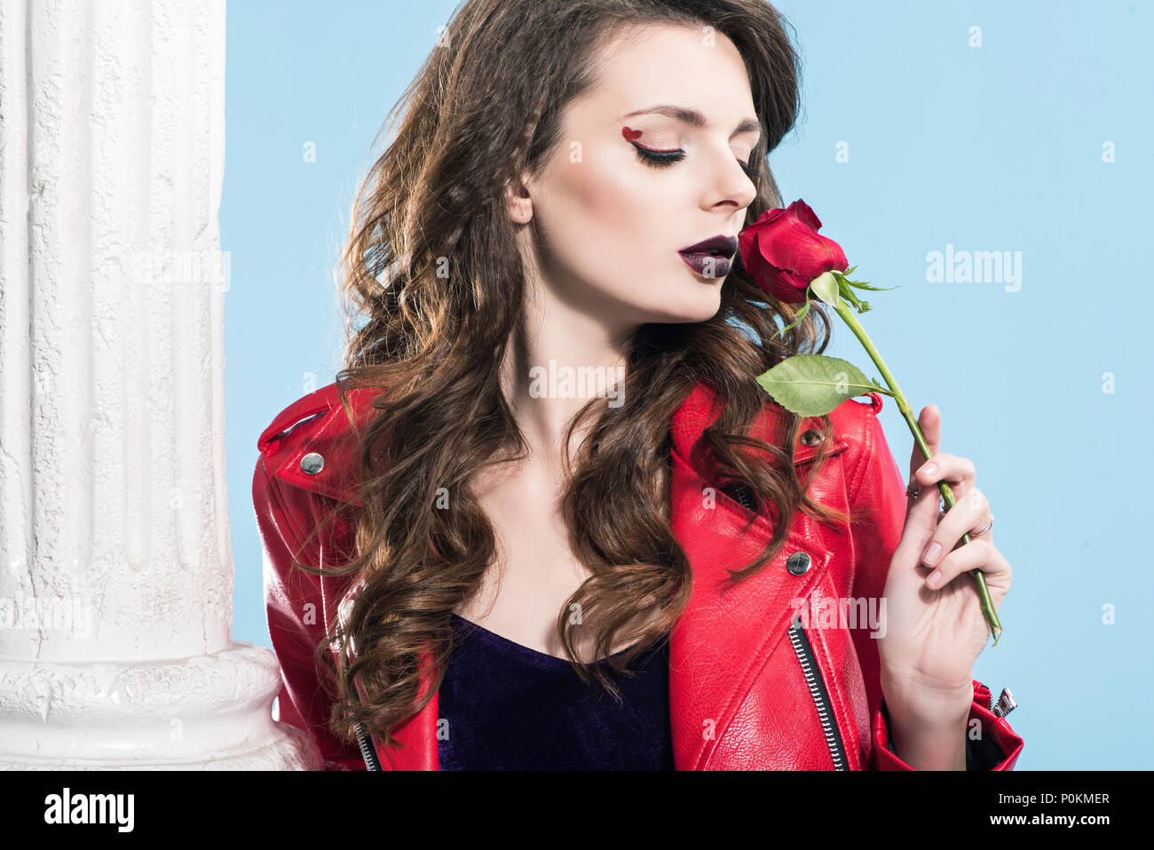 Woman sniffing rose hi-res stock photography and images - Alamy