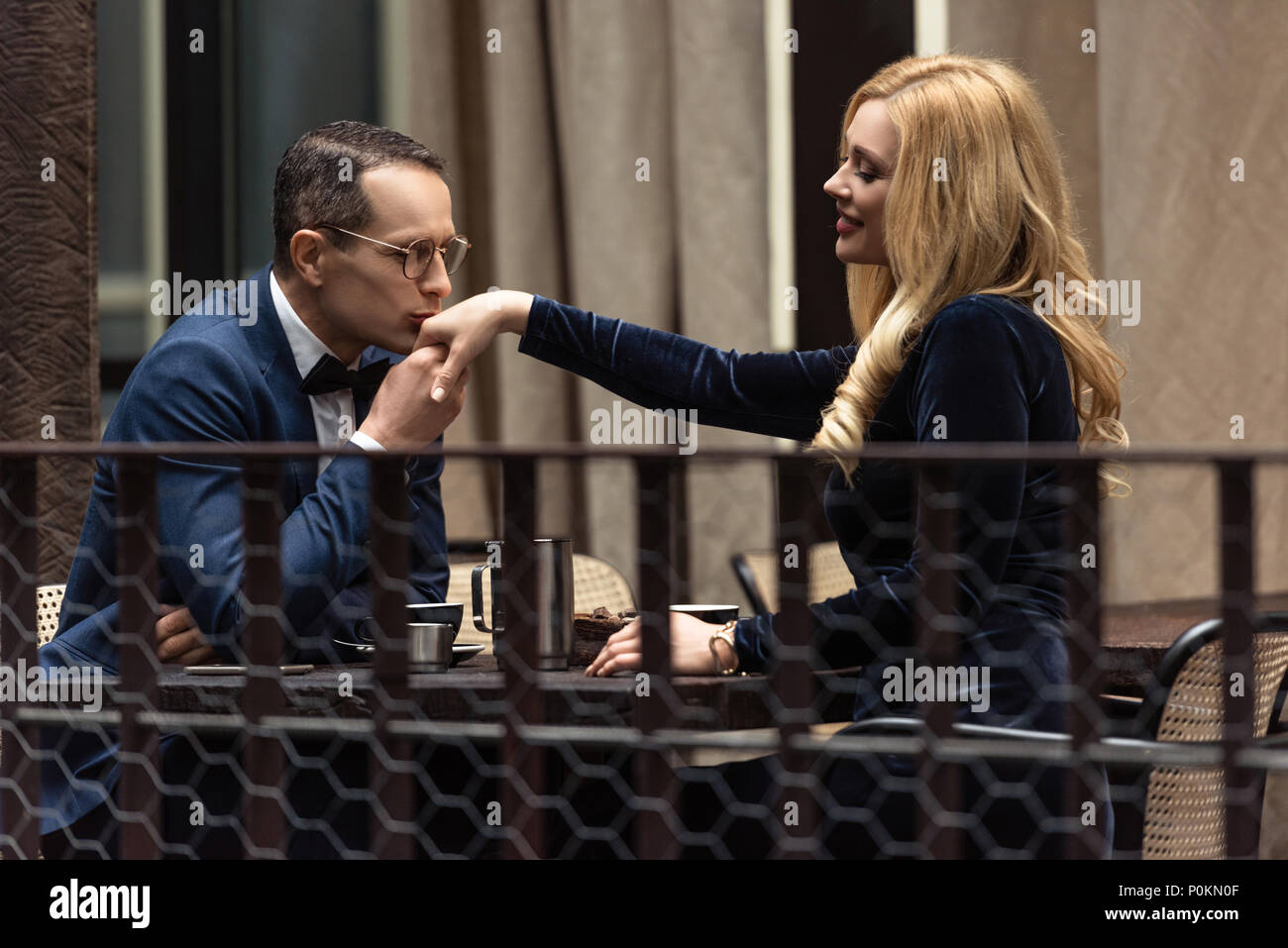 Kissing his hand hi-res stock photography and images - Alamy