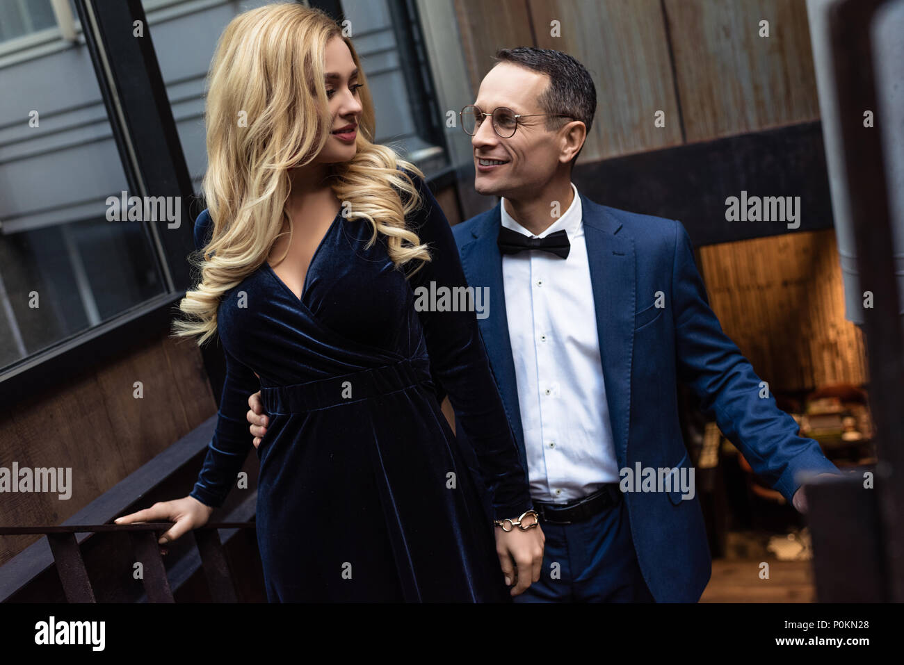 Couple going up stairs hi-res stock photography and images - Alamy