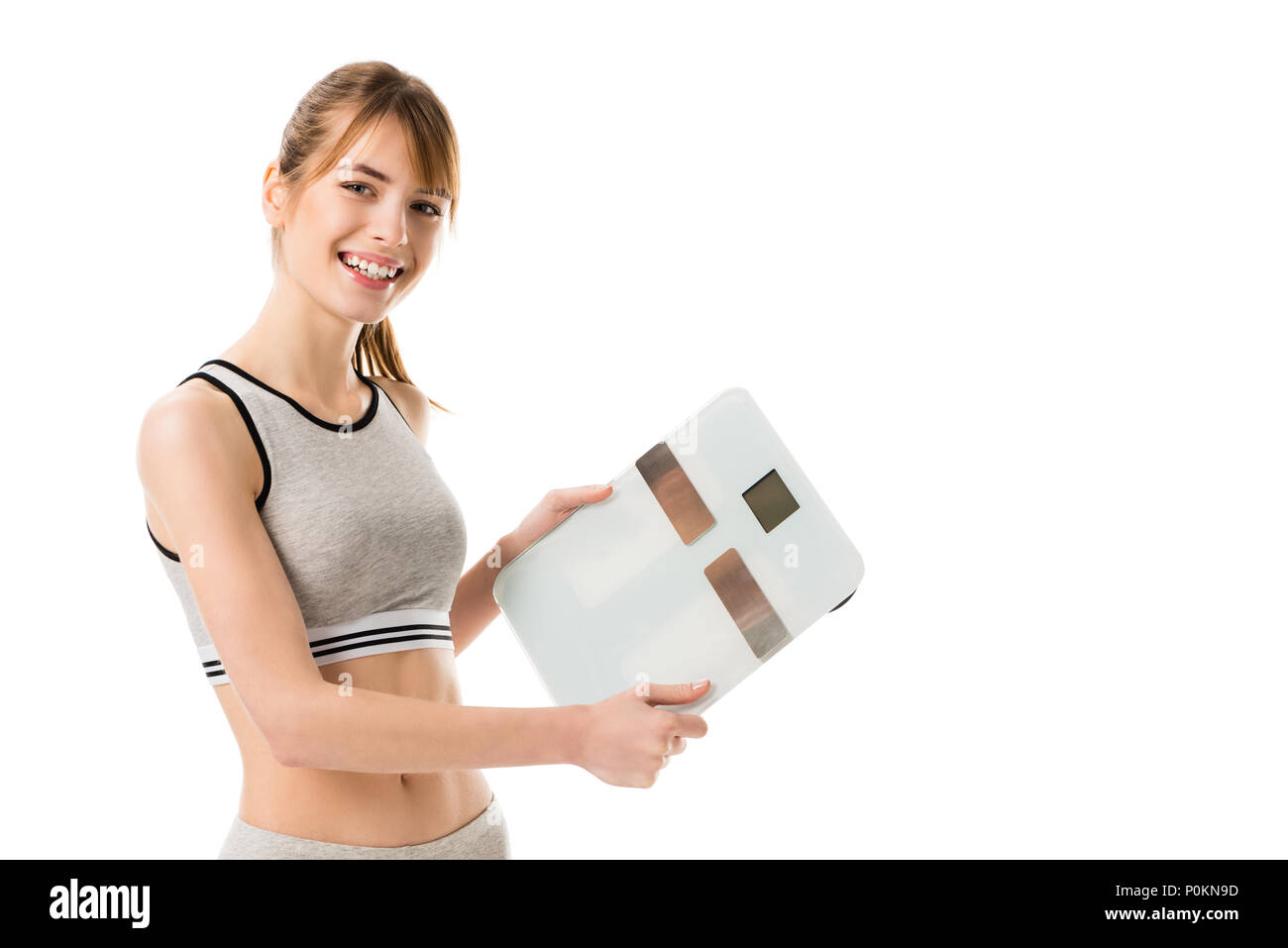 happy slim woman holding scales isolated on white Stock Photo - Alamy