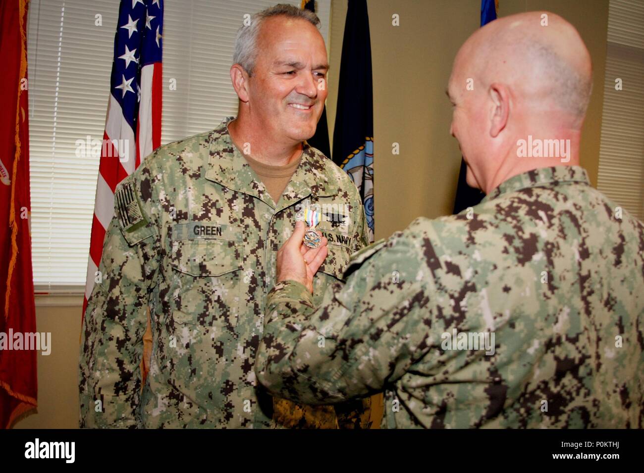 U.S. Southern Command Commander, Adm. Kurt W. Tidd, presents Rear Adm ...