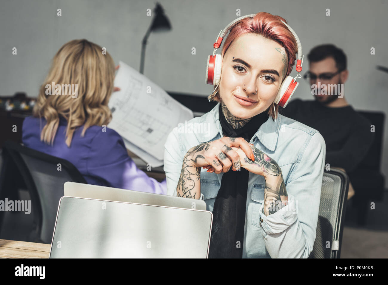 Tattoos office workers hi-res stock photography and images - Alamy