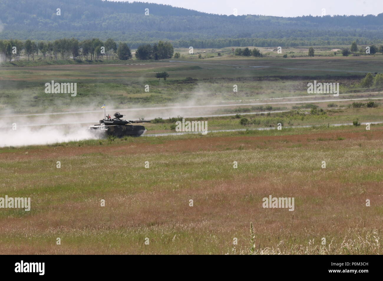 A Ukrainian T-84 tank moves down range on the Grafenwoehr Training Area ...