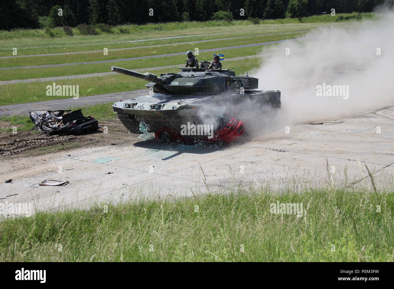 A Swedish tank goes through the Precision Driving Lane during the 2018 ...