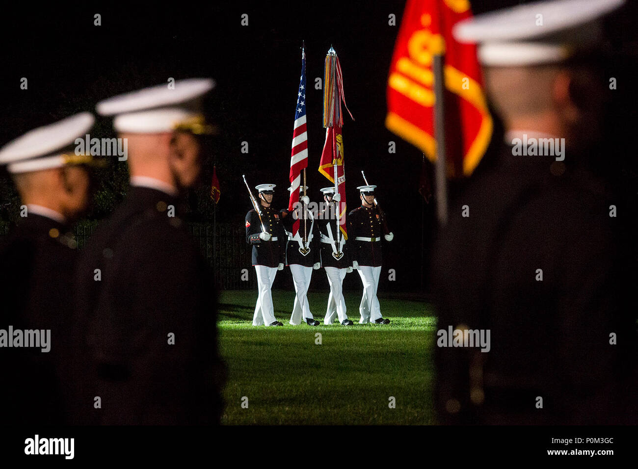 Marines with the U.S. Marine Corps Color Guard march the National ...