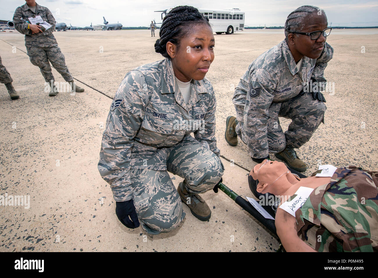 U.S. Air Force Senior Airman Selina N. Okyere, center, and Staff Sgt ...