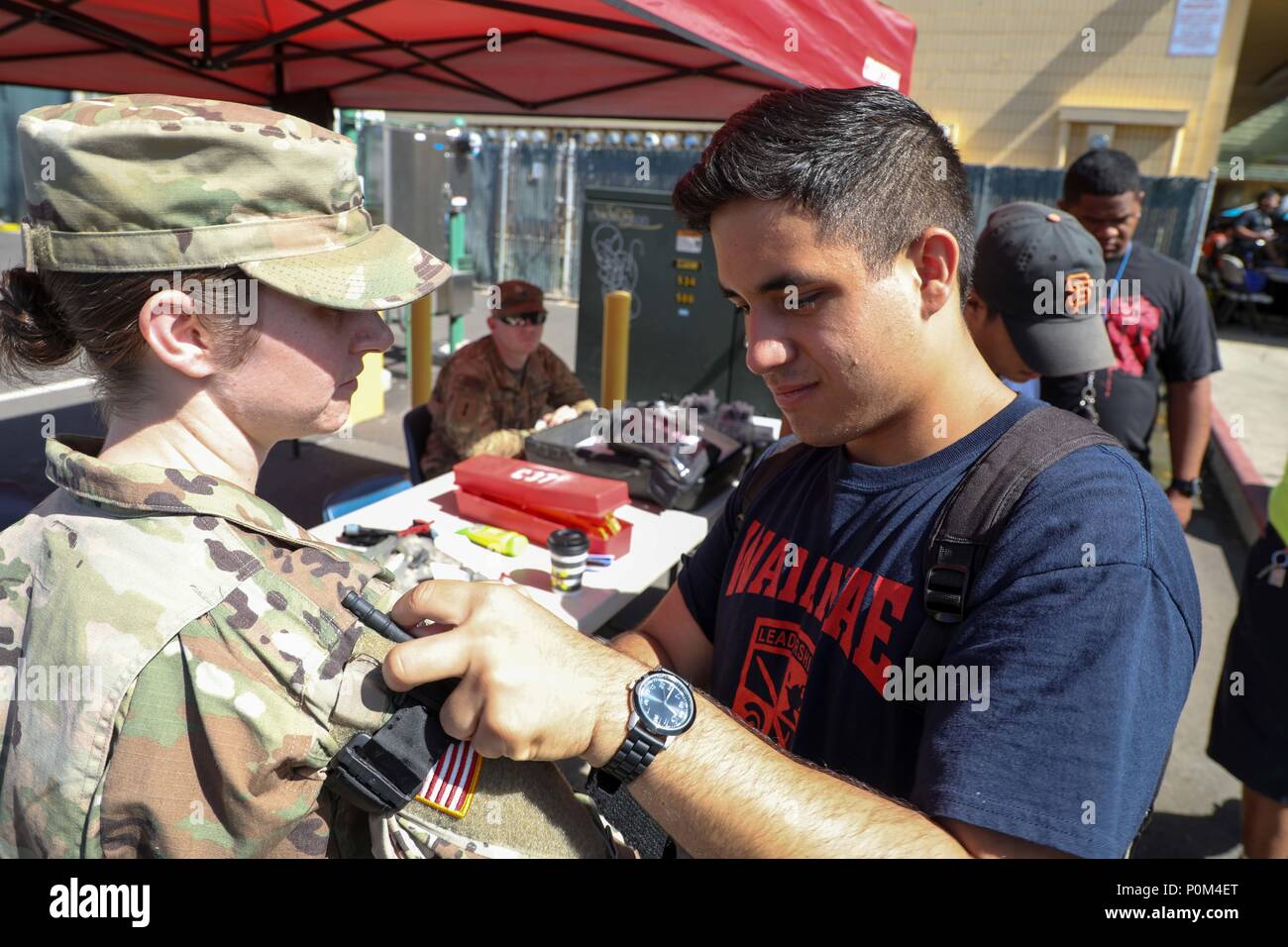 Spc. Elena Stein (left), a medical specialist with 225th Brigade ...