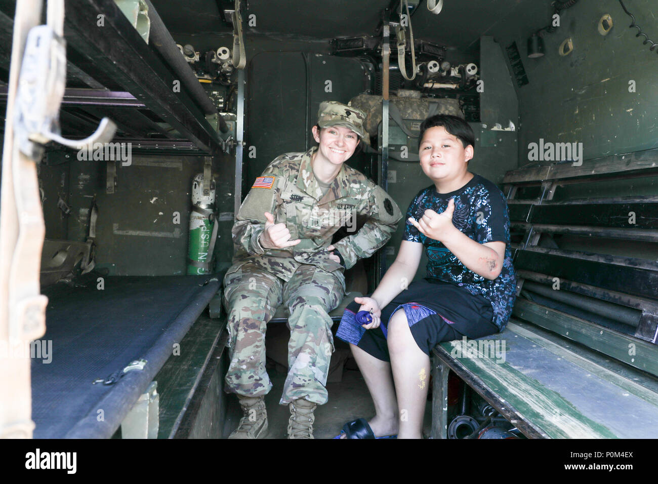 Spc. Elena Stein (left), a medical specialist with 225th Brigade ...