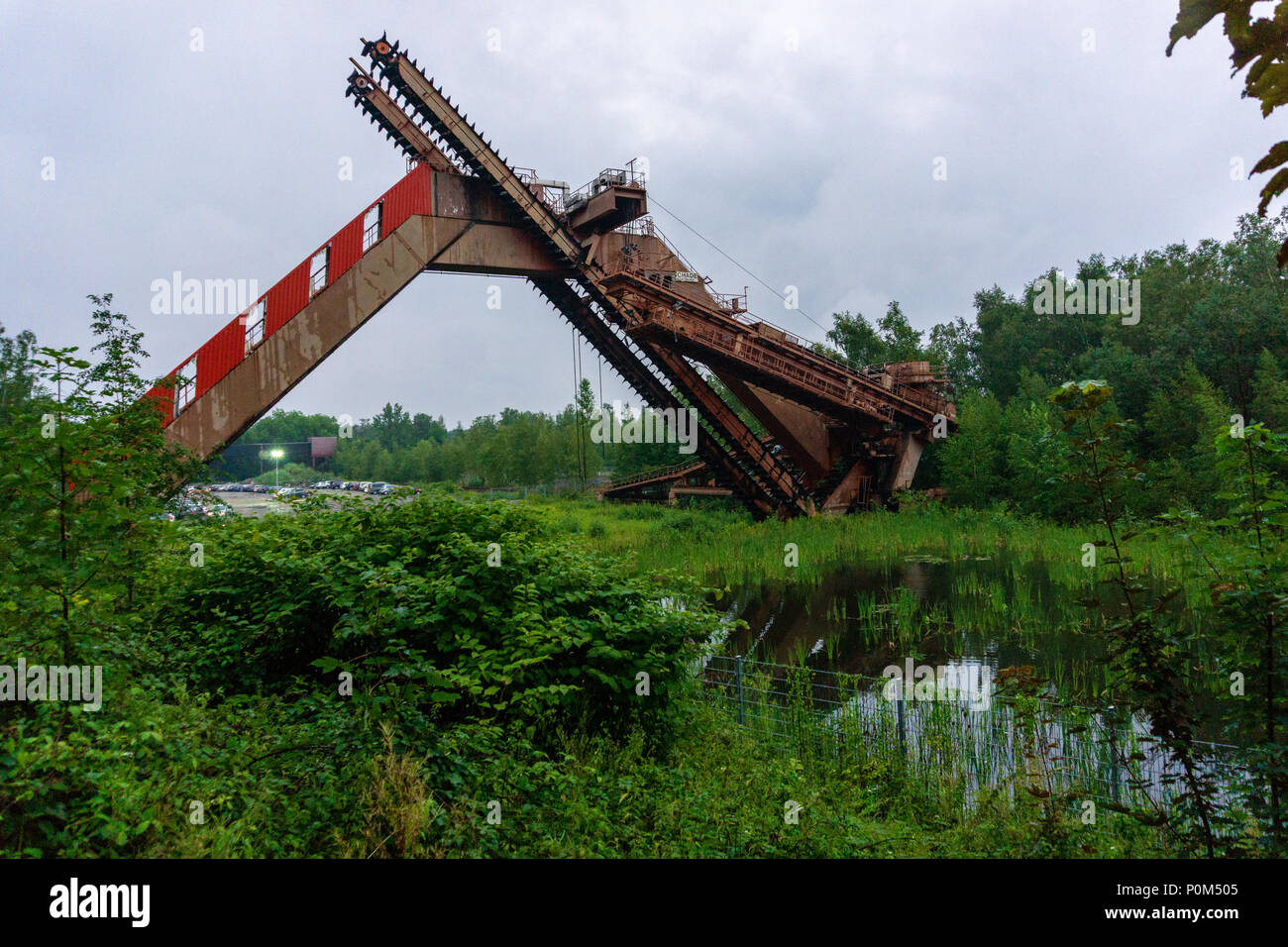 excavator mining coal mine evening Stock Photo - Alamy