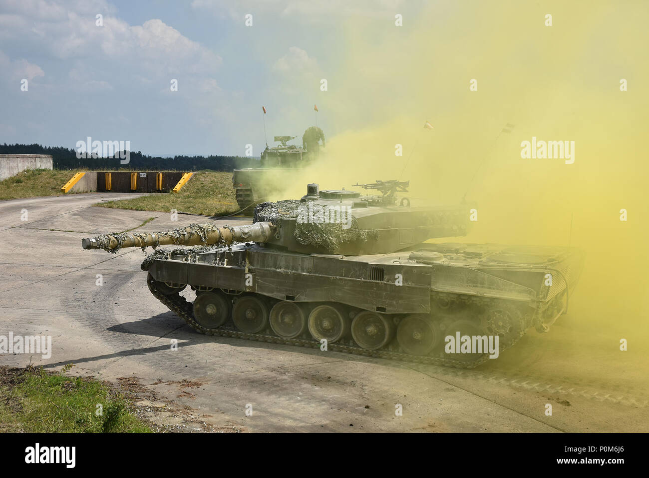 Tankers in Austria’s 6th Tank Company, 14th Panzer Battalion react to a ...