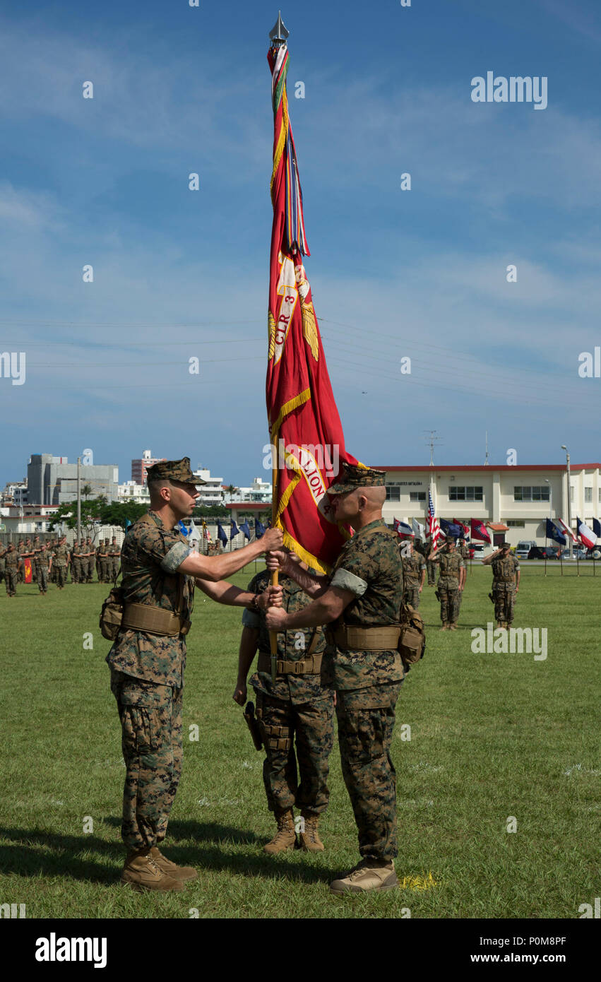 CAMP FOSTER, OKINAWA, Japan – Lt. Col. William H. Nash passes on the ...
