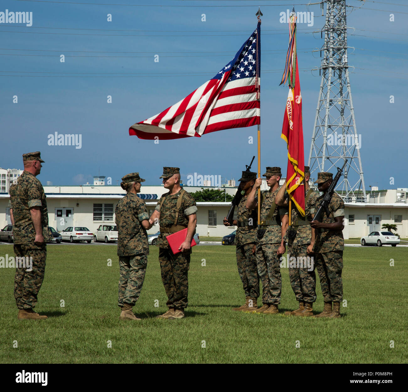 CAMP FOSTER, OKINAWA, Japan – Col. Maura M. Hannigan congratulates Lt ...