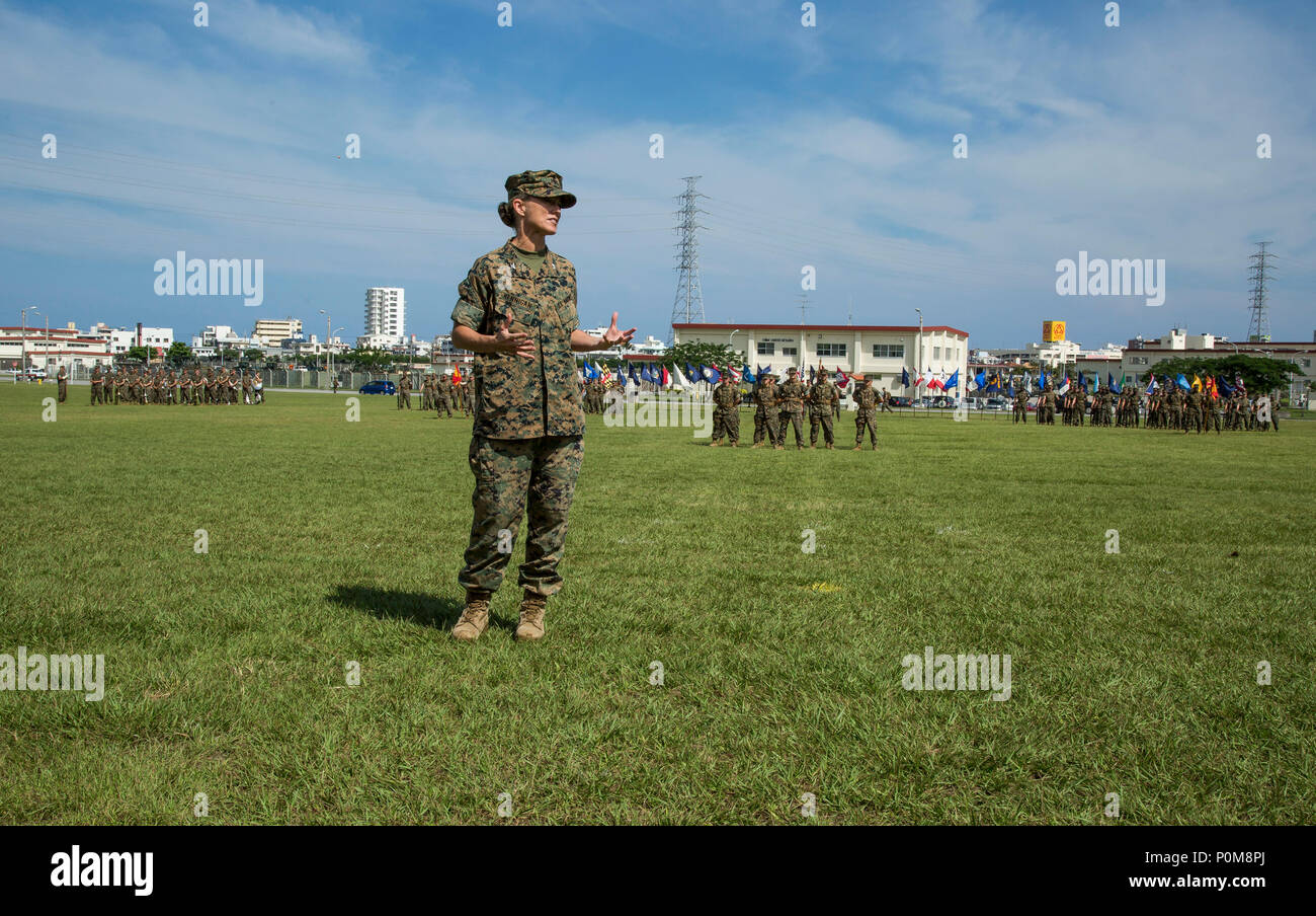 CAMP FOSTER, OKINAWA, Japan – Col. Maura M. Hannigan speaks to the ...