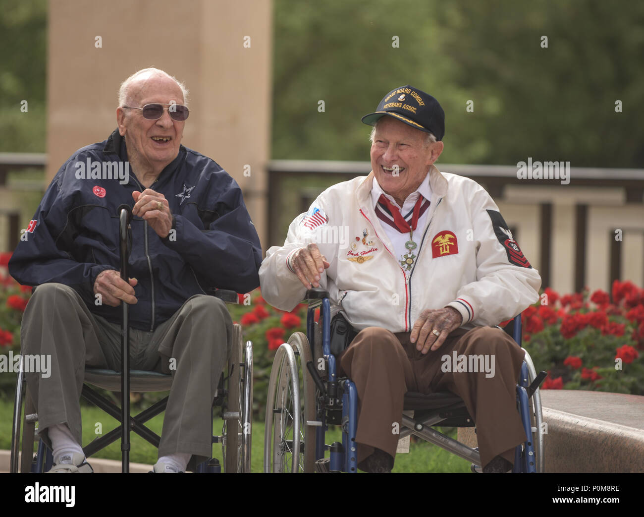 Two World War II Veterans laugh at each others jokes while waiting for ...