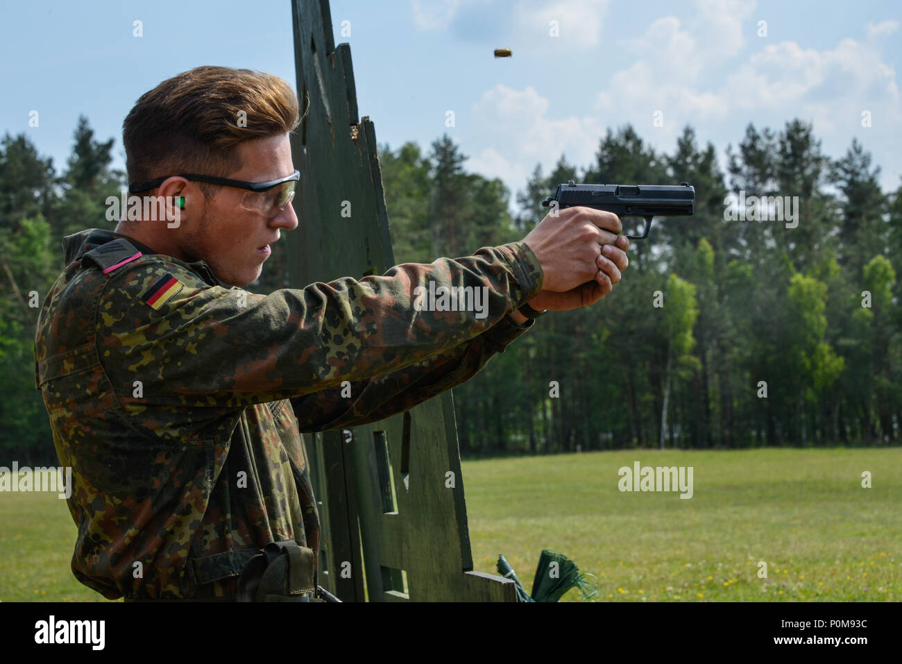 A German soldier assigned to the 3rd Panzer Battalion participates in ...