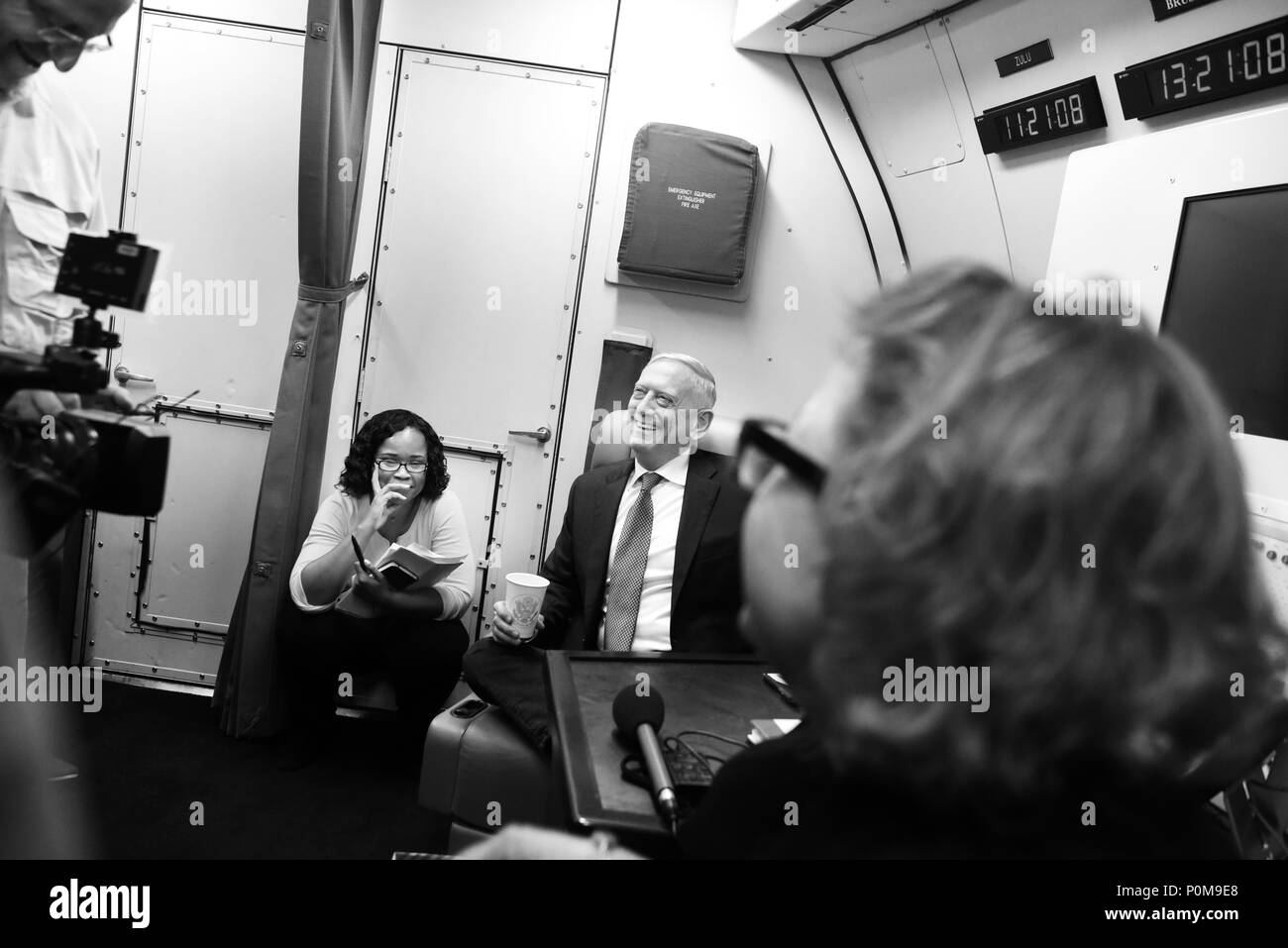 Secretary of Defense James N. Mattis speaks with reporters while on ...