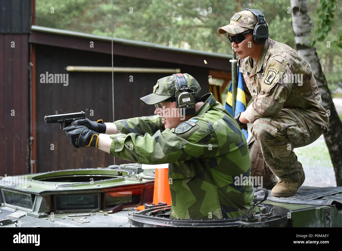 A Swedish soldier, left, with the Wartofta Tank Company, Skaraborg ...