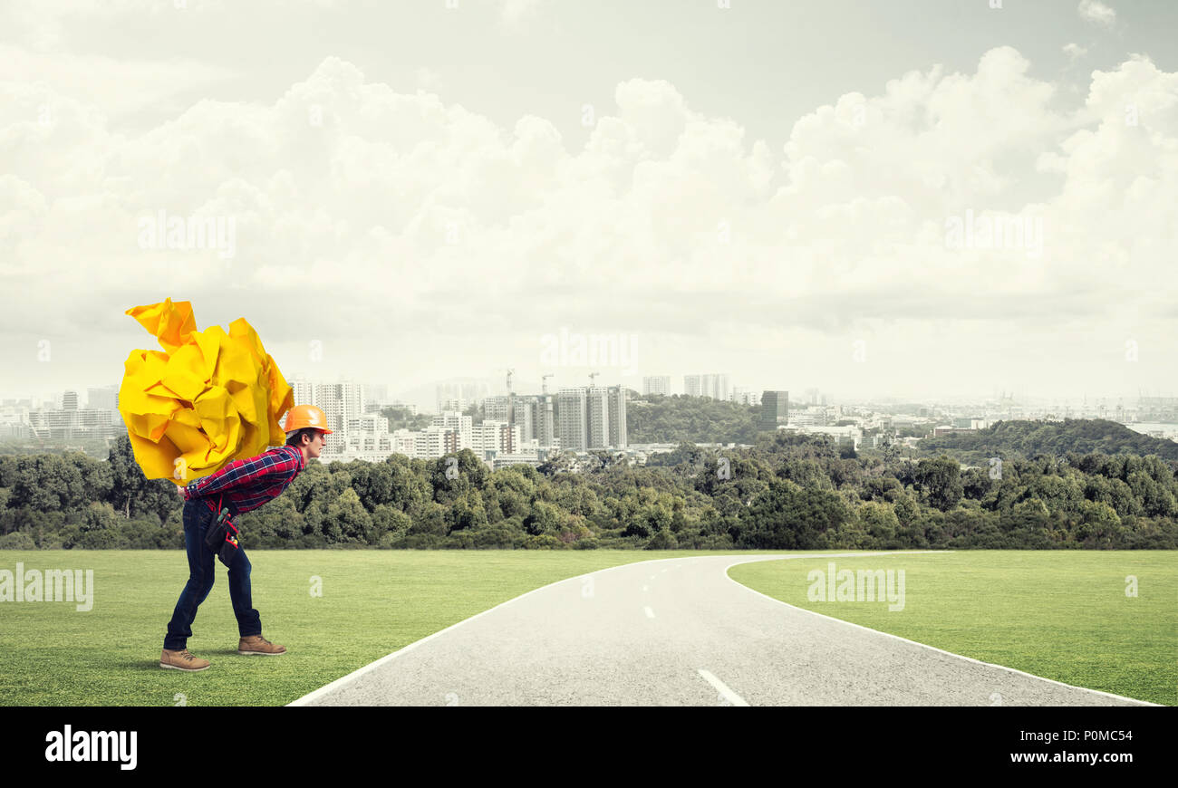 Engineer man carry load Stock Photo - Alamy