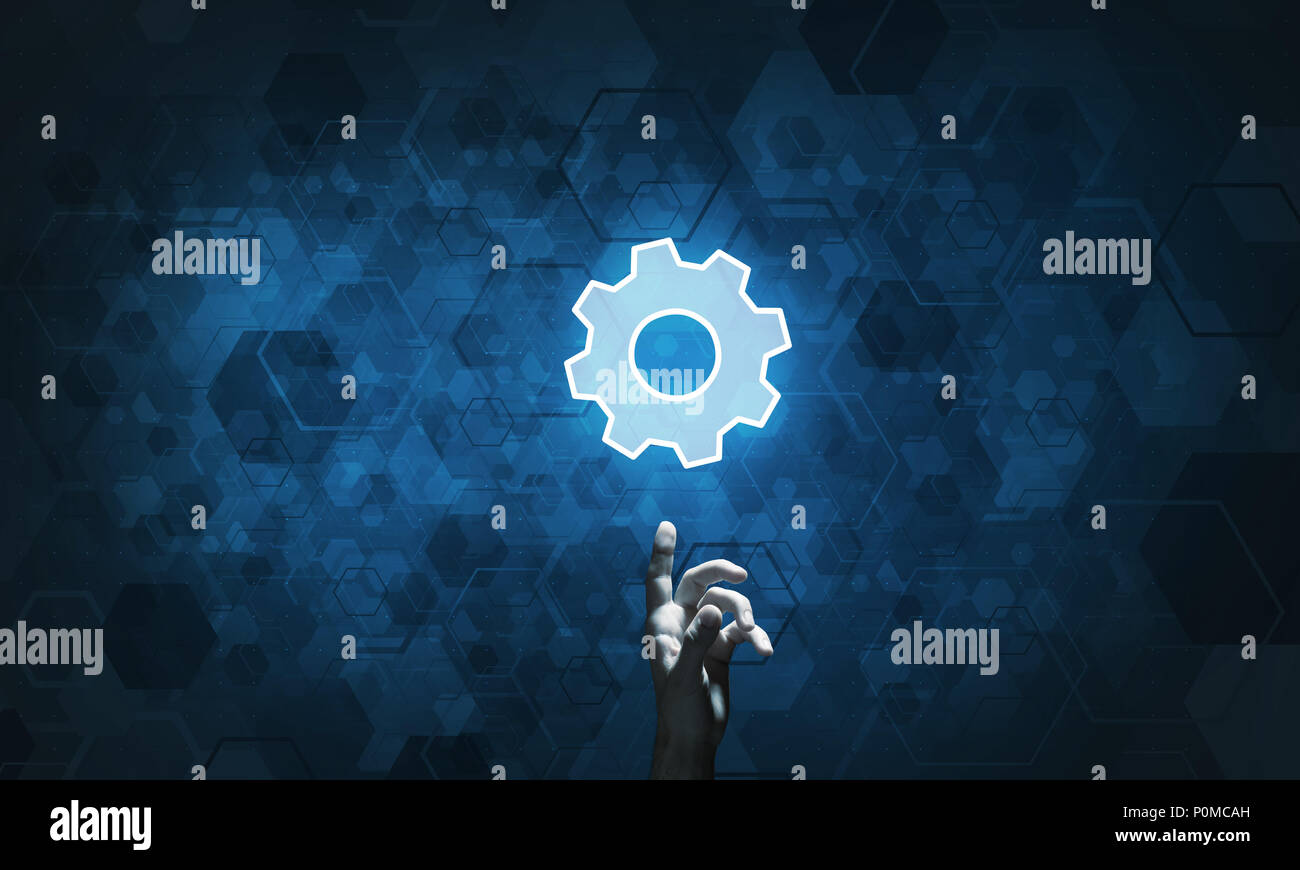 Technology conceptual image with gear digital symbol on dark background ...