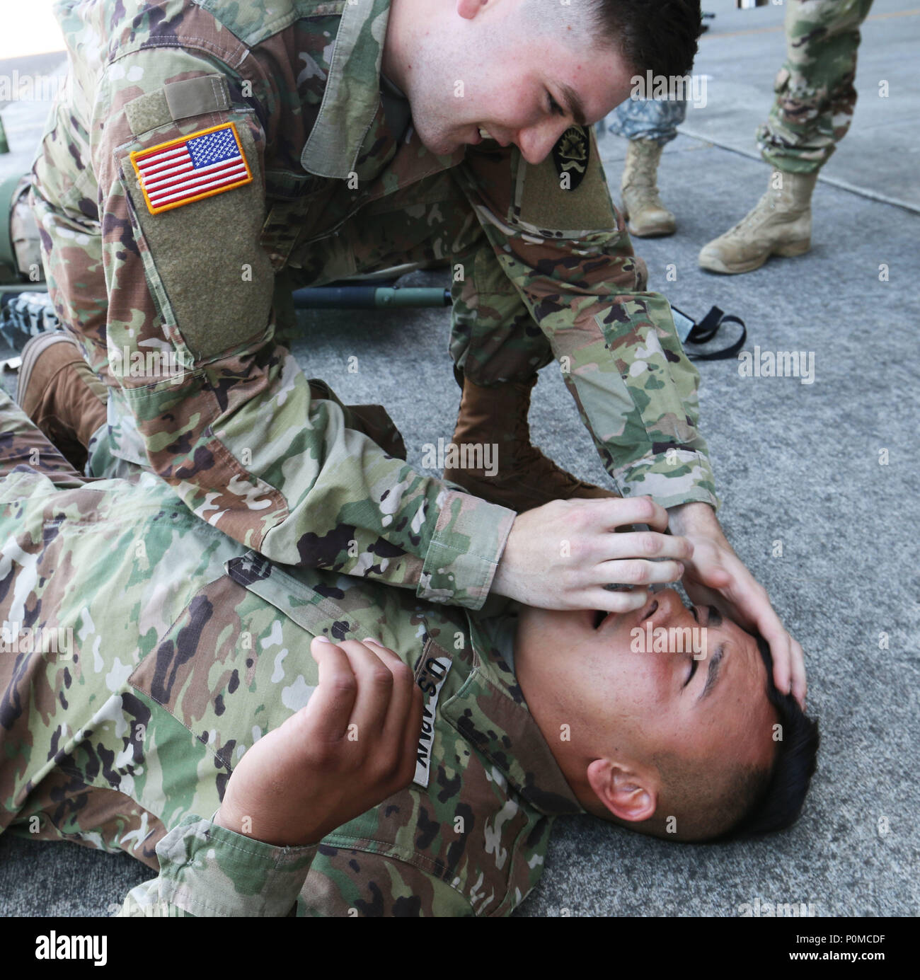 Oregon Army National Guard Pvt. 1st Class Trevor Miles, with ...