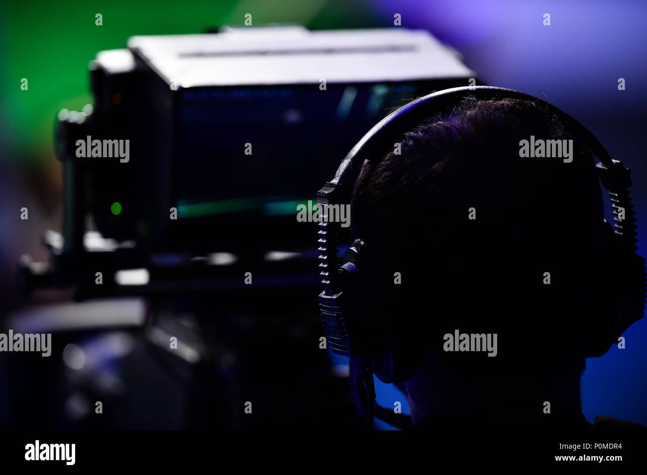 Cameraman filming inside a news television set Stock Photo - Alamy
