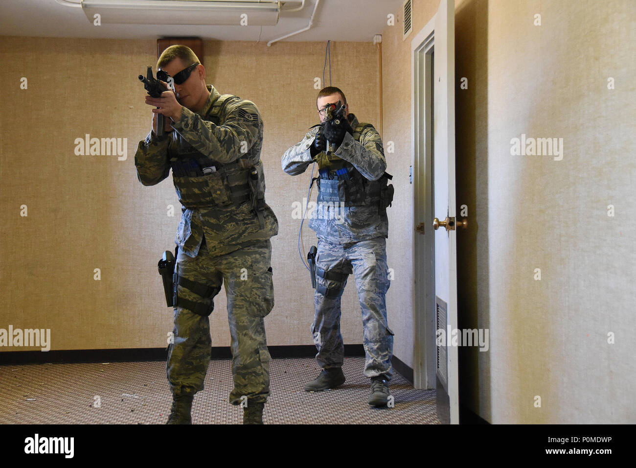 Tech. Sgt. Chris Williams and Staff Sgt. Jordon Thompson clear a room ...