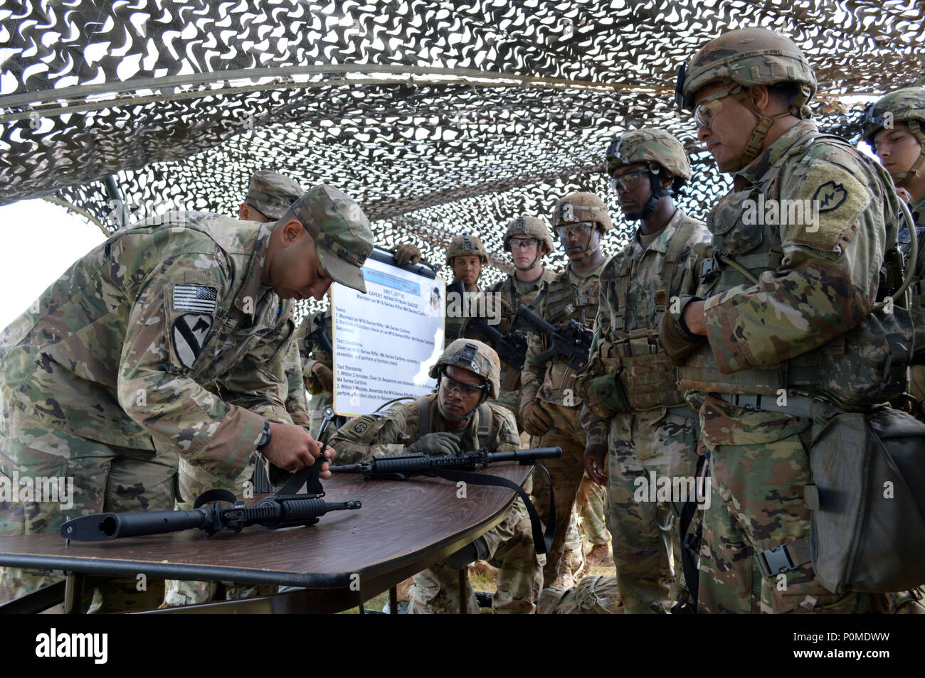 Sgt. Edward Navarrete (left), an infantryman assigned to 2nd Battalion ...