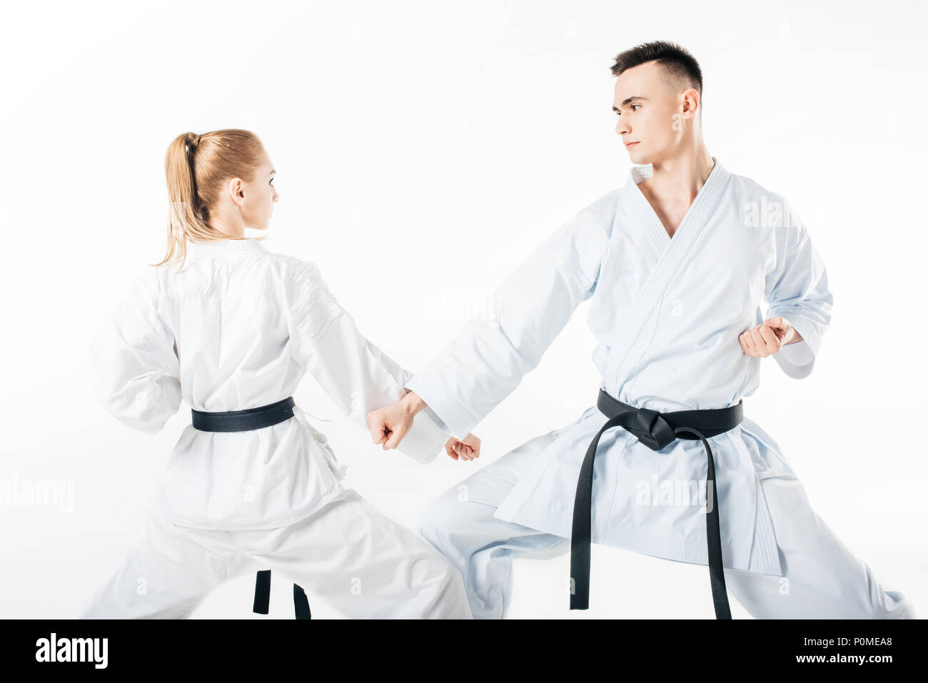 karate fighters training block isolated on white Stock Photo - Alamy