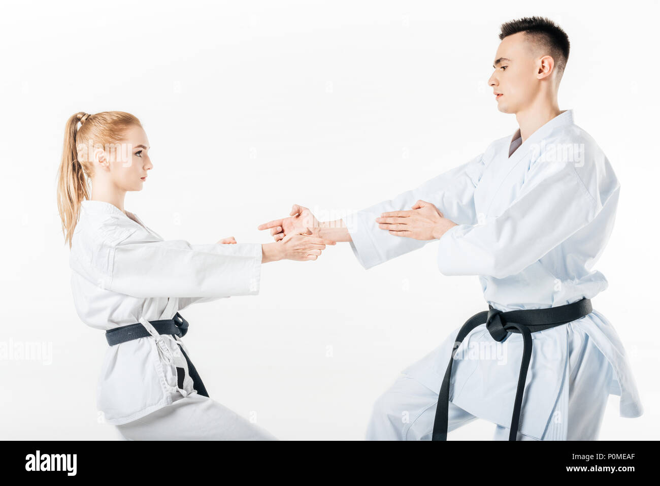 karate fighters standing in poses isolated on white Stock Photo - Alamy