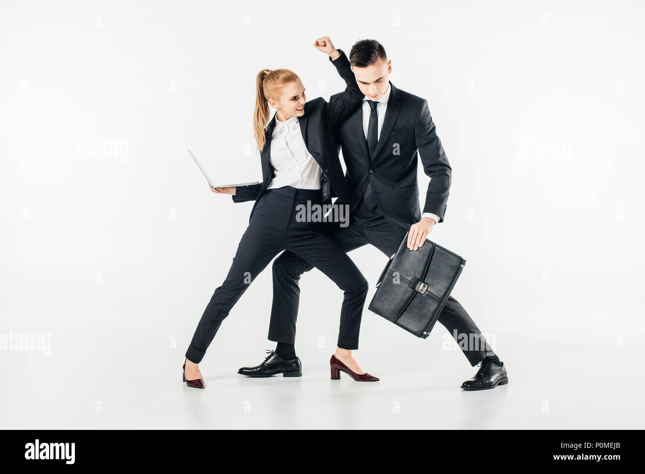 People fighting in business suits hi-res stock photography and images ...